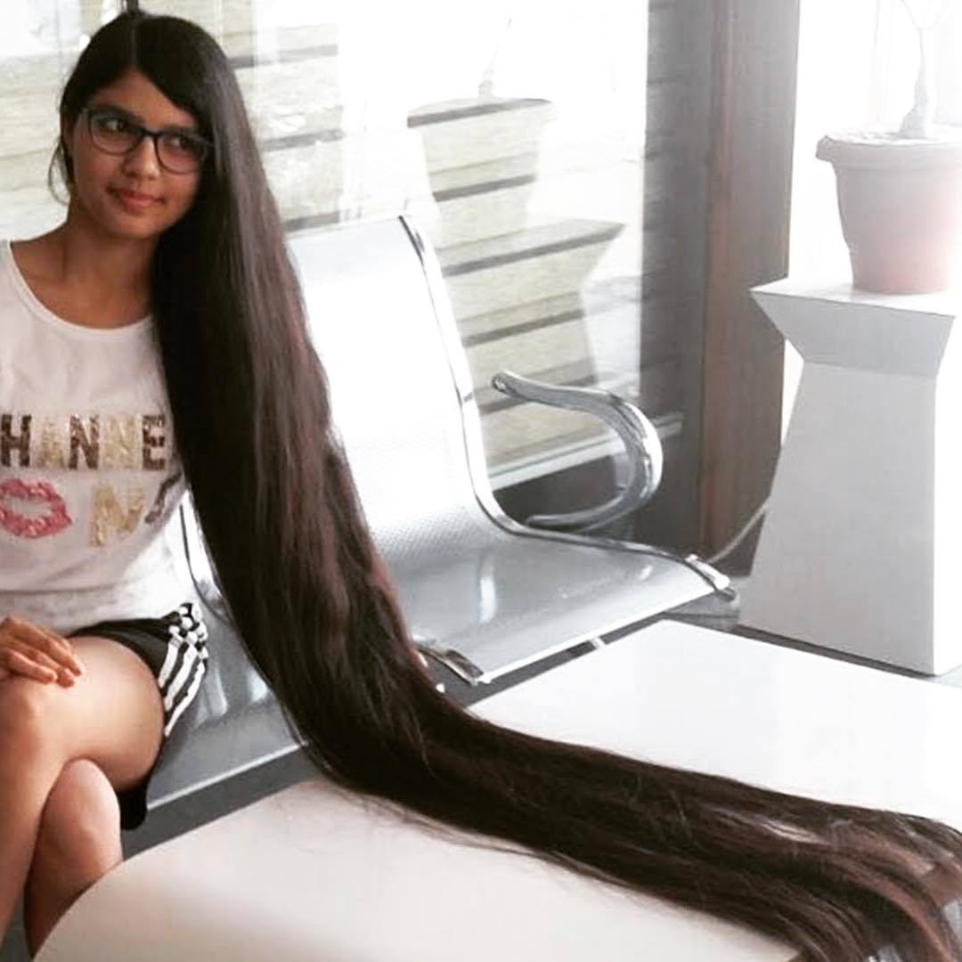 Jovem com o maior cabelo do mundo leva 1 hora para pentear fios - Fotos ...