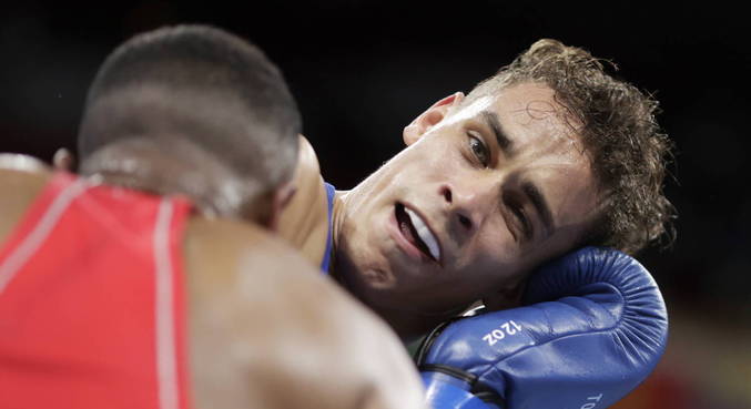 Boxeador olímpico é desclassificado por tentar morder orelha de rival ...
